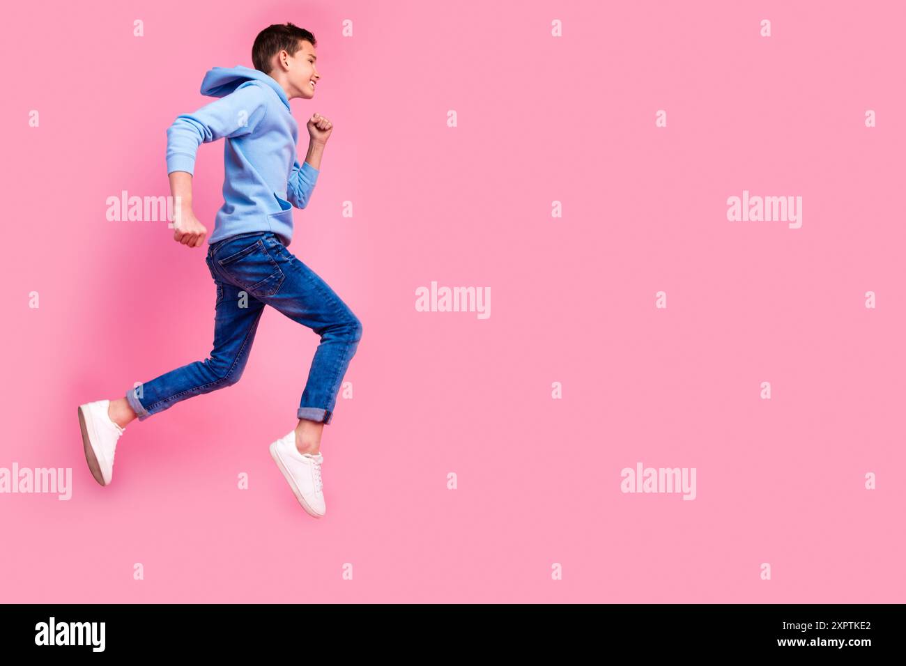 Full size photo of funny teenager boy hurry running wear trendy blue ...