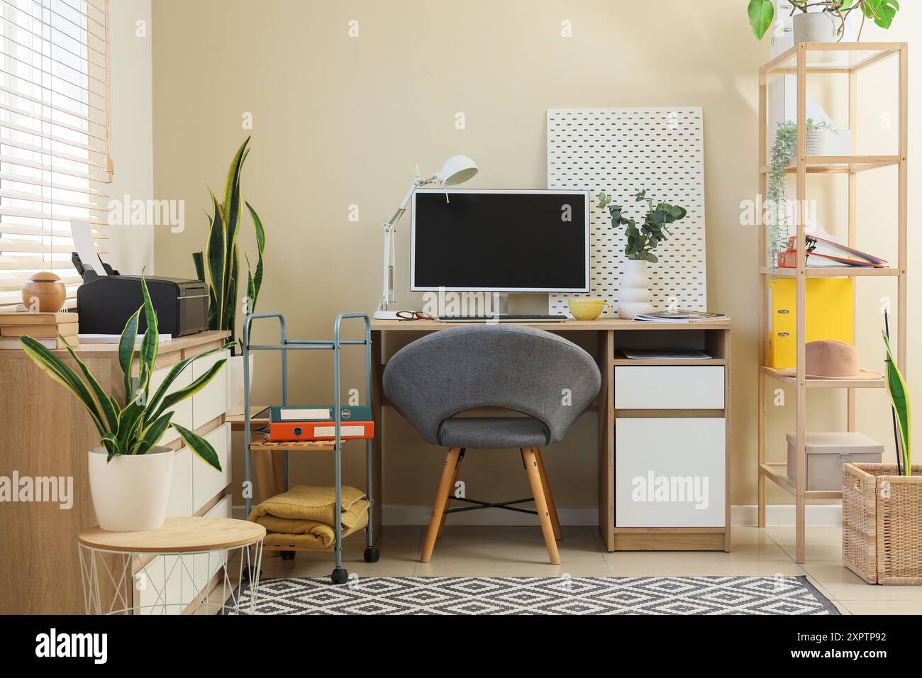 Interior of office with workplace and printer on commode Stock Photo ...