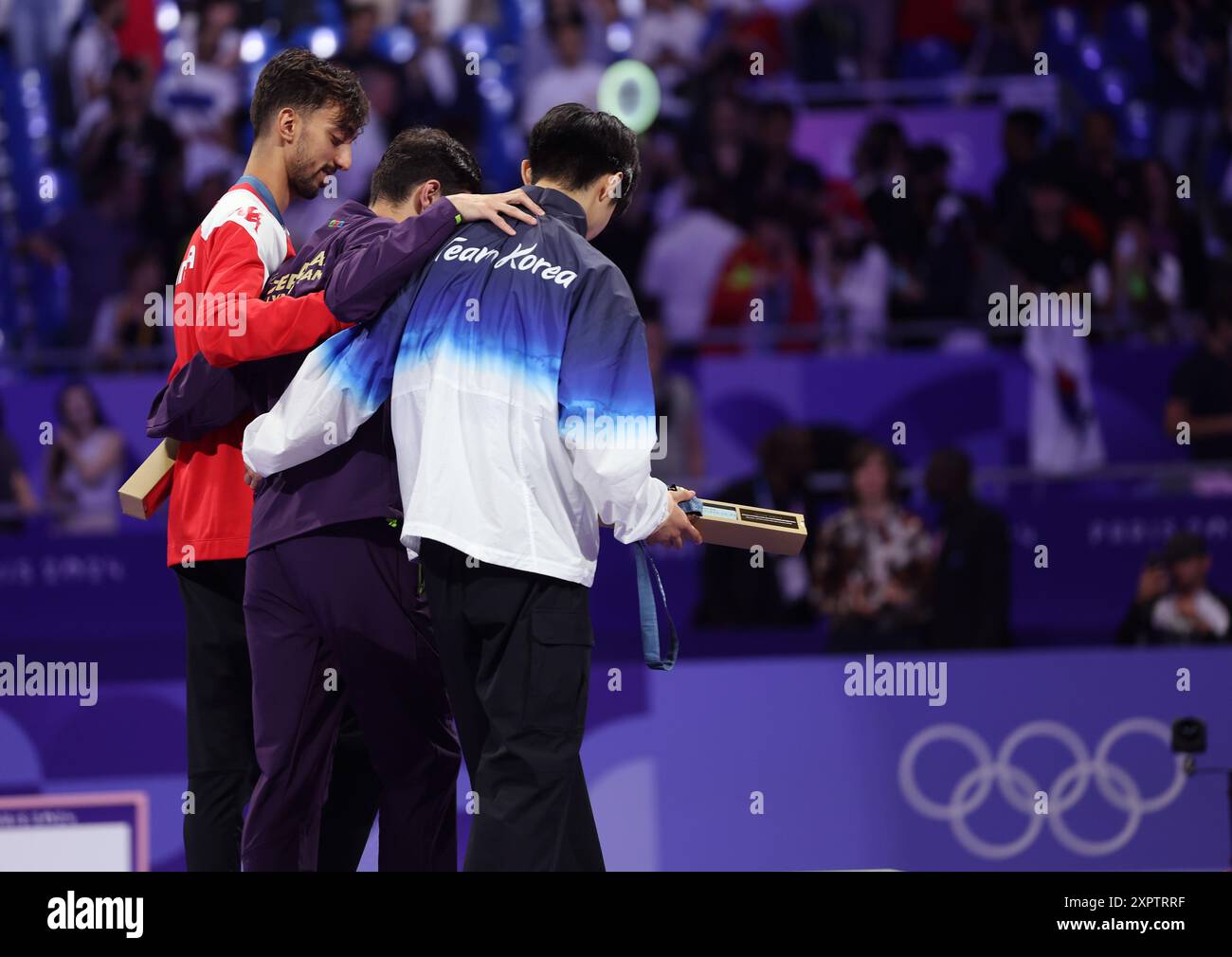 Paris, France. 7th Aug, 2024. Gold medalist Park Taejoon (R) of South ...