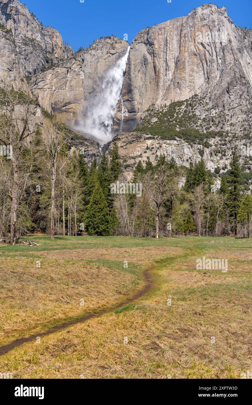 Waterfall Trail - A hiking trail winding through a Spring meadow ...