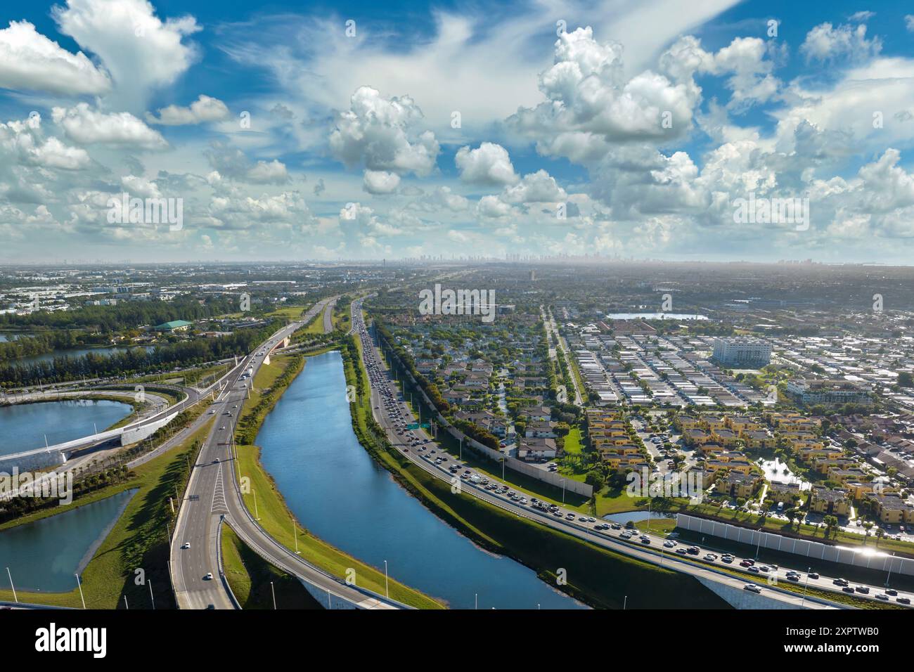 Aerial view of american freeway intersection with fast driving cars and ...