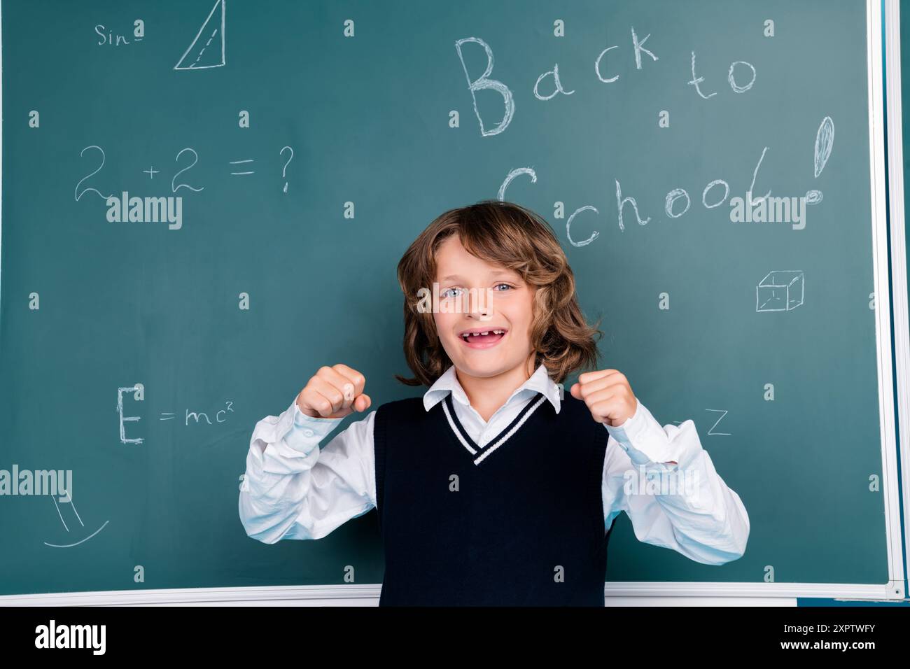 Photo of smart clever diligent glad boy wear uniform study school pass ...