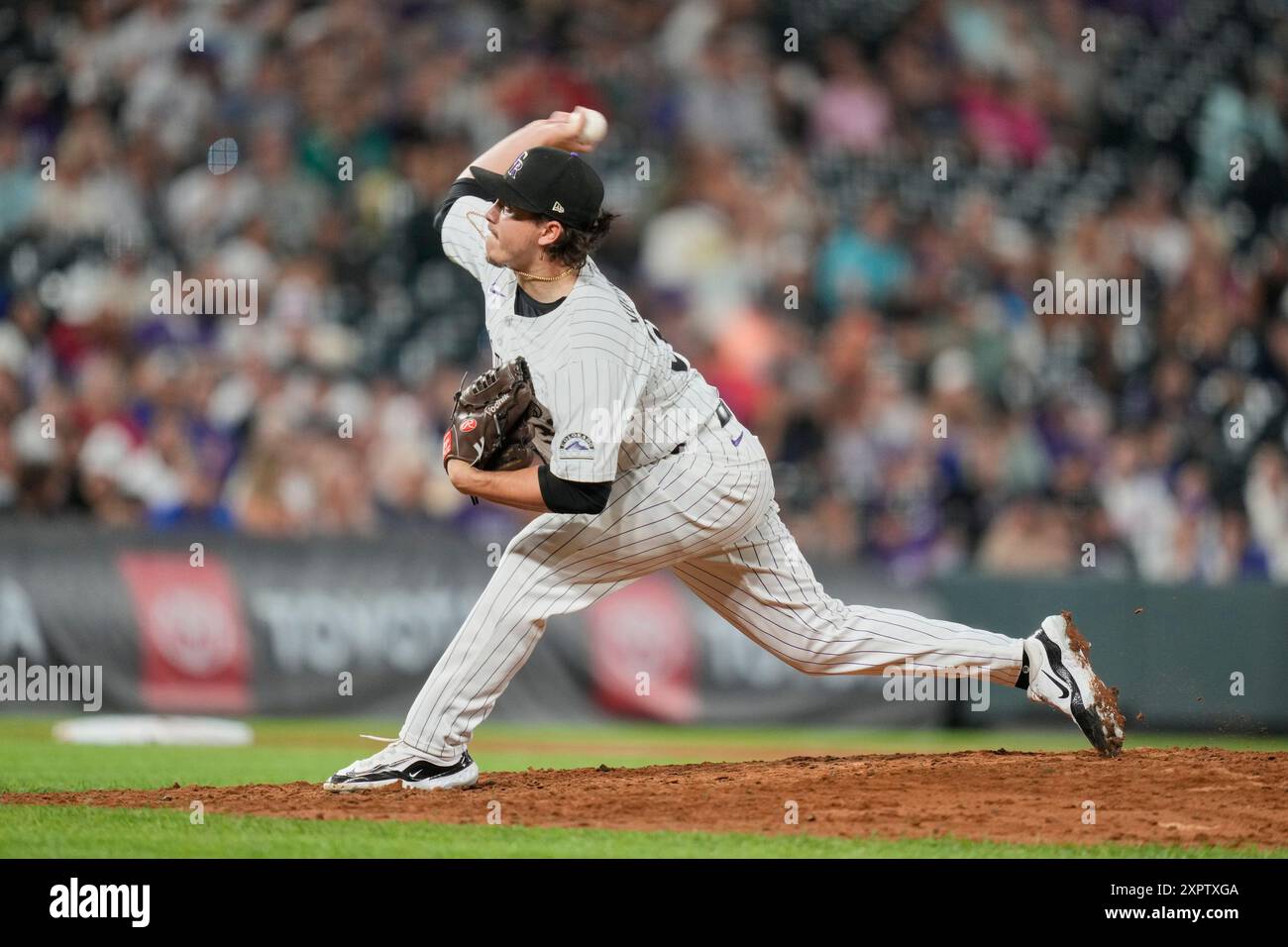 August 6 2024: Colorado pitcher Victor Vodnik (38) throws a pitch ...