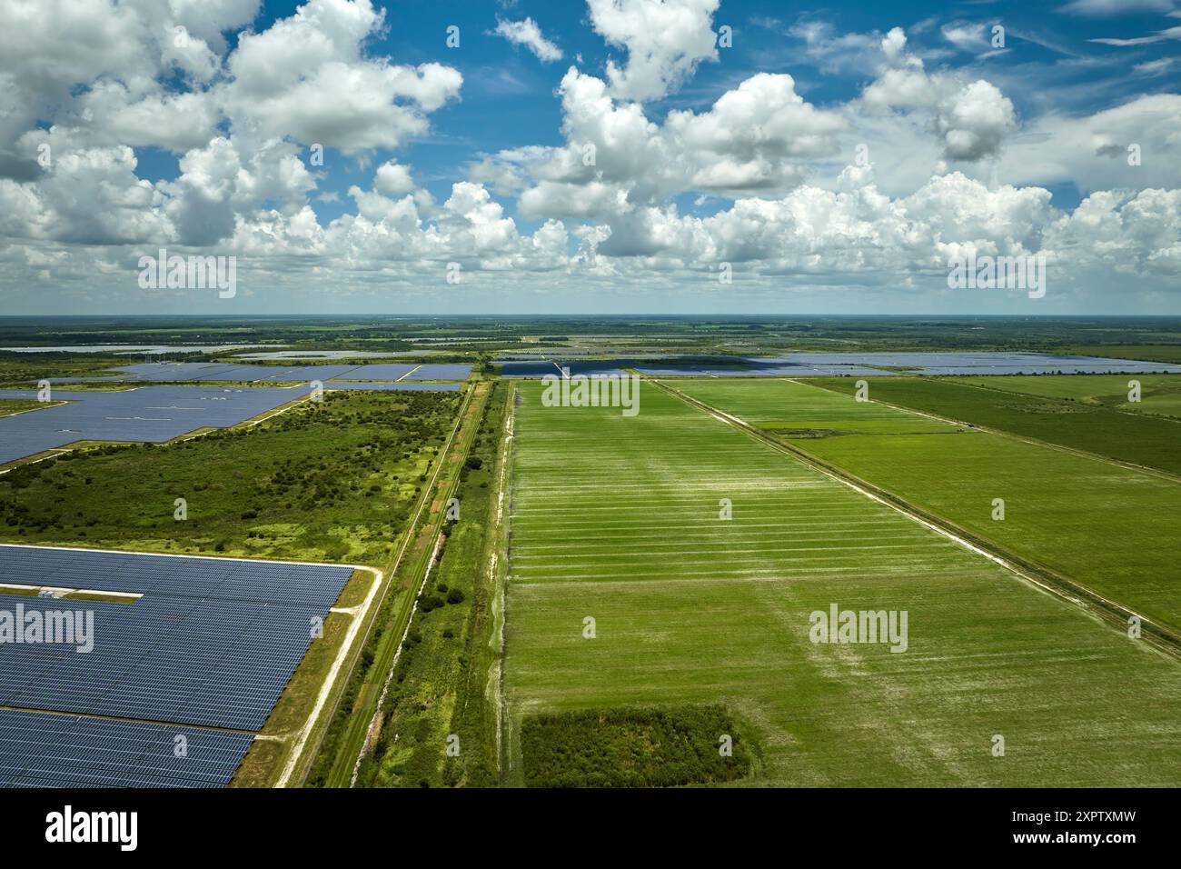Aerial view of sustainable electric power plant between agricultural ...