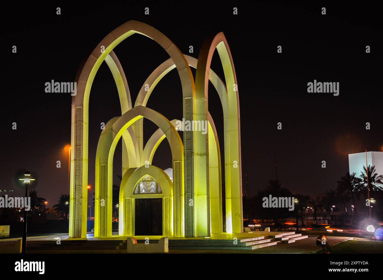 Night view of arch sculpture at al Bida park in Doha, Qatar Stock Photo ...