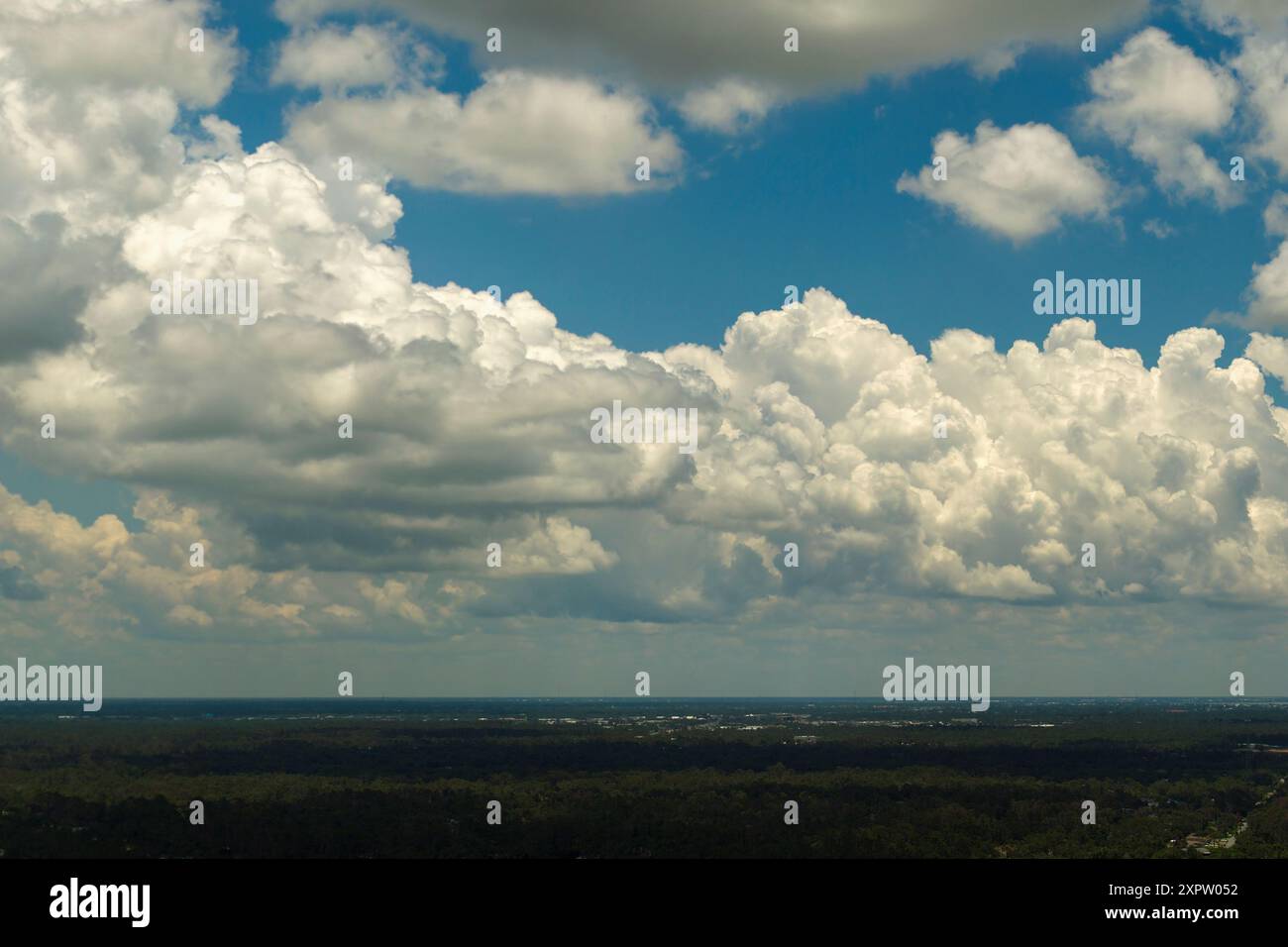 Blue sky with white clouds. Bright summer skyscape Stock Photo - Alamy
