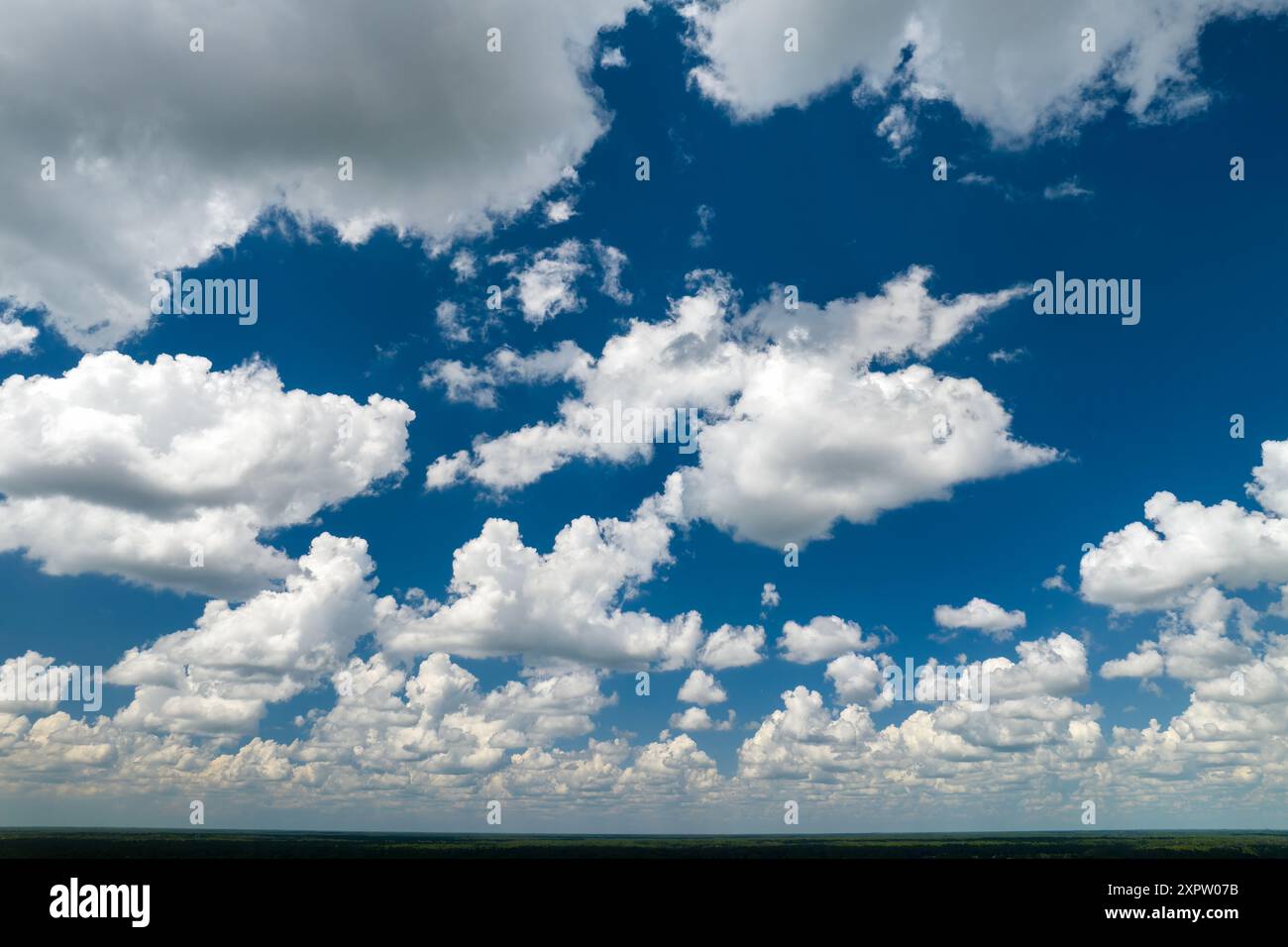 Blue sky with white clouds. Bright summer skyscape Stock Photo - Alamy