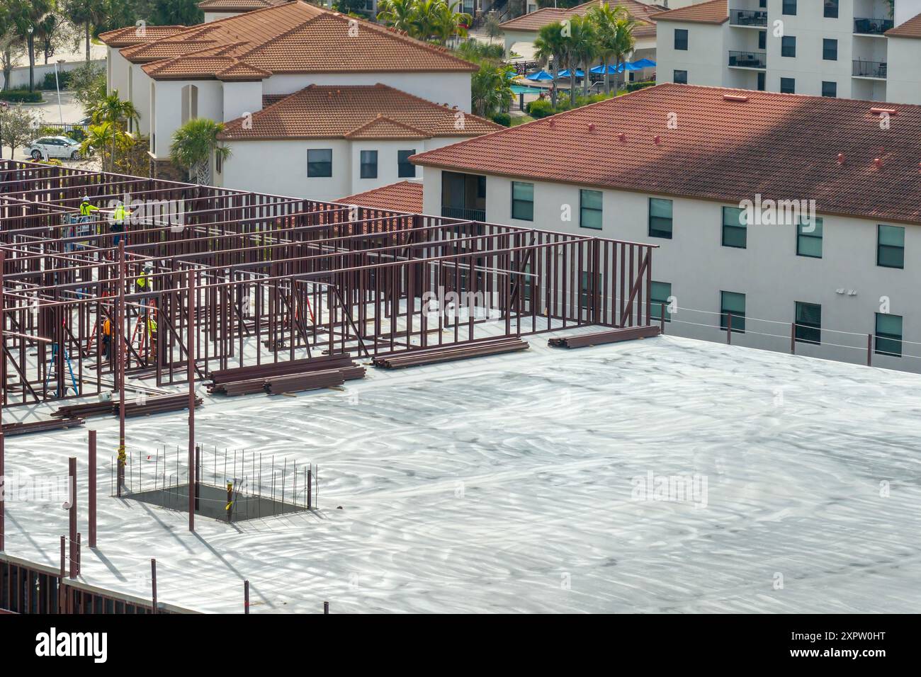 Construction site with many workers and equipment in Fort Myers ...