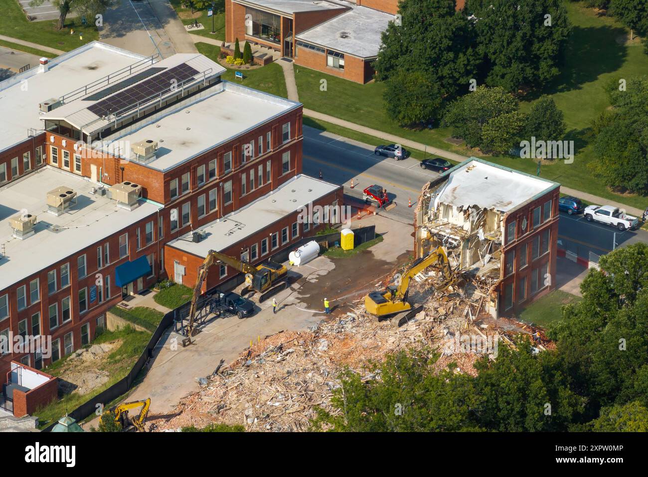 Demolition of Historic Edwards Building in Berea, Kentucky. Crawler ...
