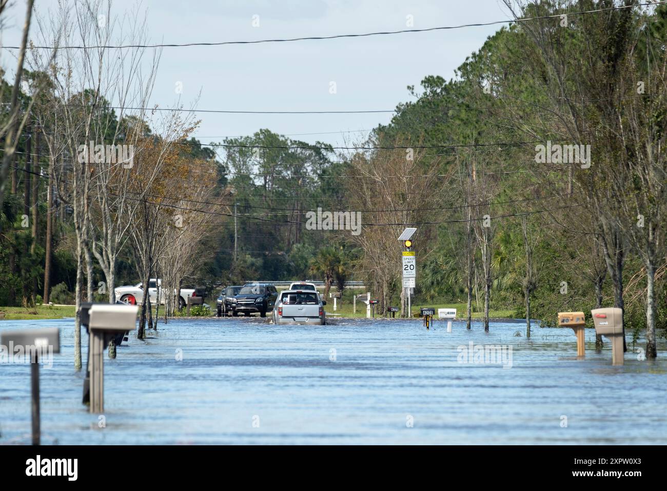 Flooded empty street after hurricane rainfall in Florida residential ...