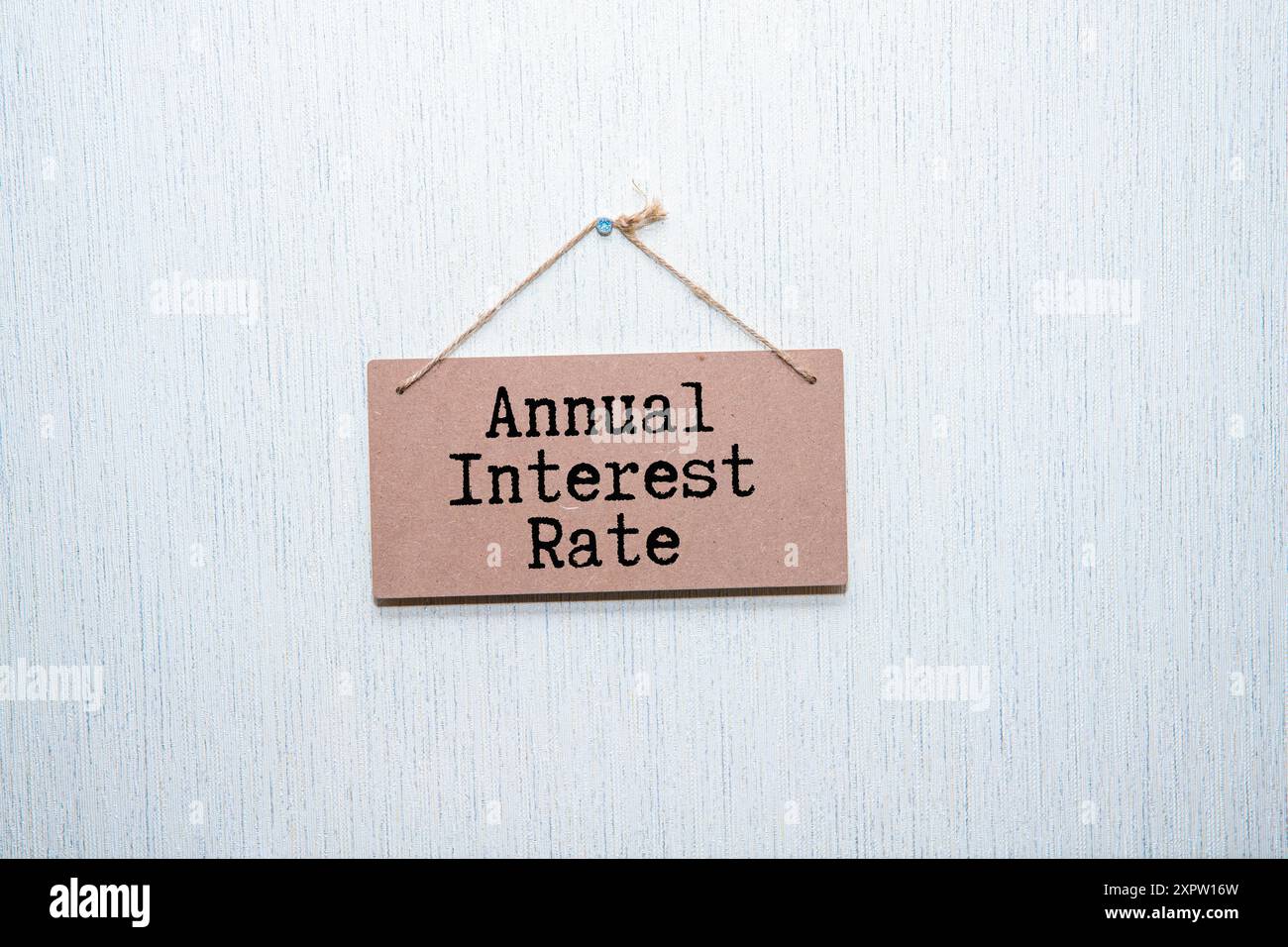 ANNUAL INTEREST RATE, text on notepad page on gray background Stock ...