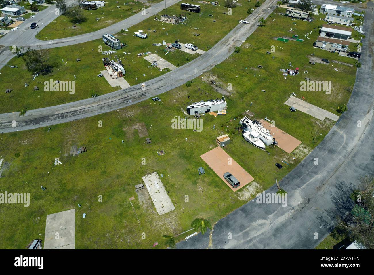 Hurricane damage to recreational vehicle camper vans and houses in ...