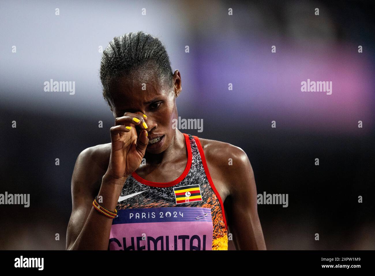 Peruth Chemutai of, Uganda. , . looks dejected after women's 3000 meter ...