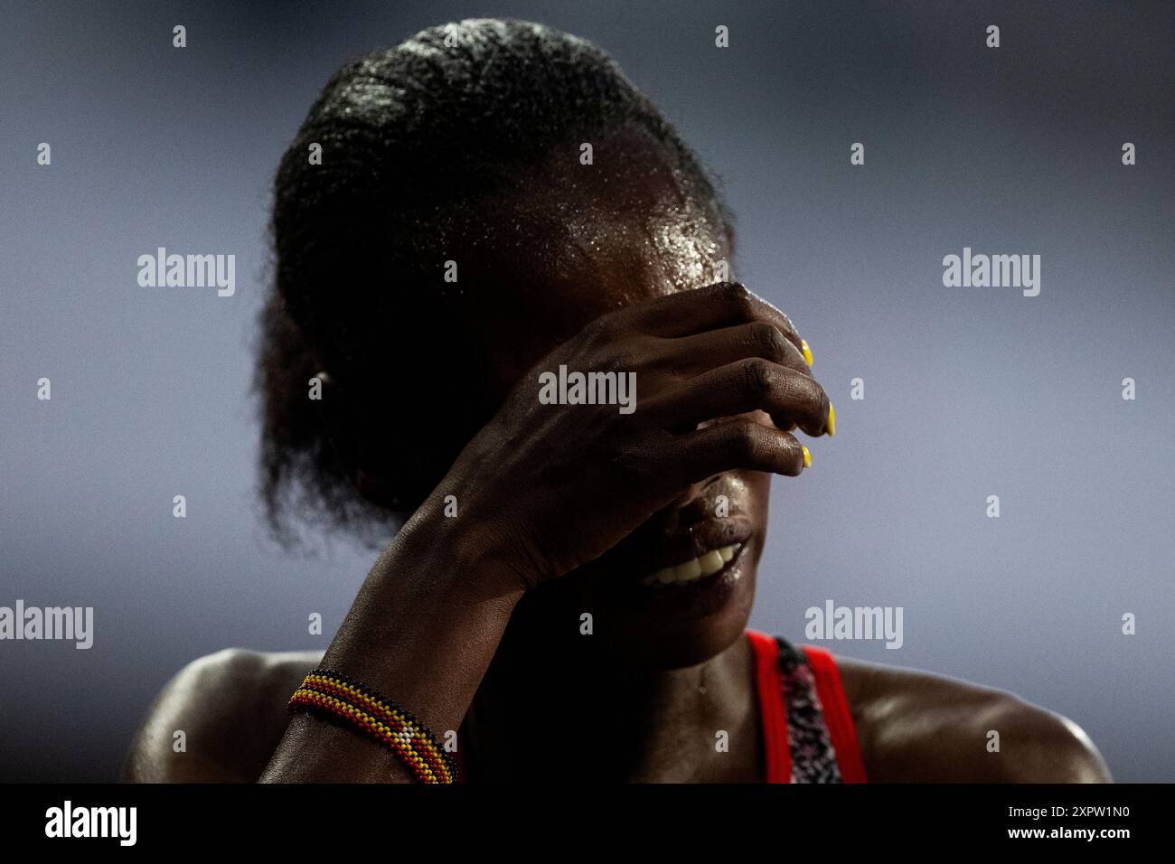 Peruth Chemutai of, Uganda. , . looks dejected after women's 3000 meter ...
