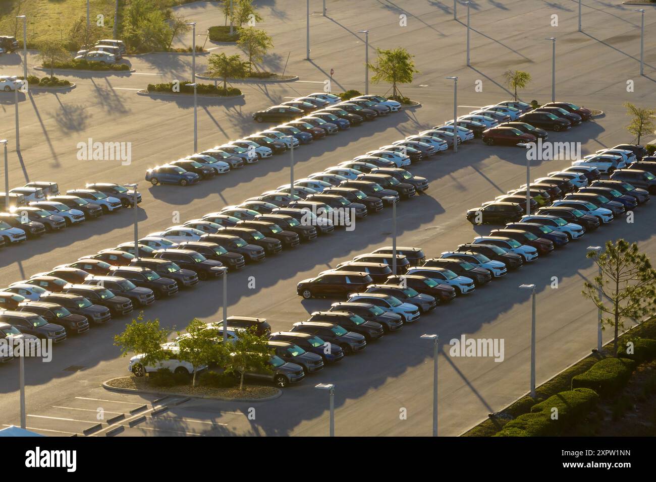 Large parking lot of local dealer with many brand new cars parked for ...