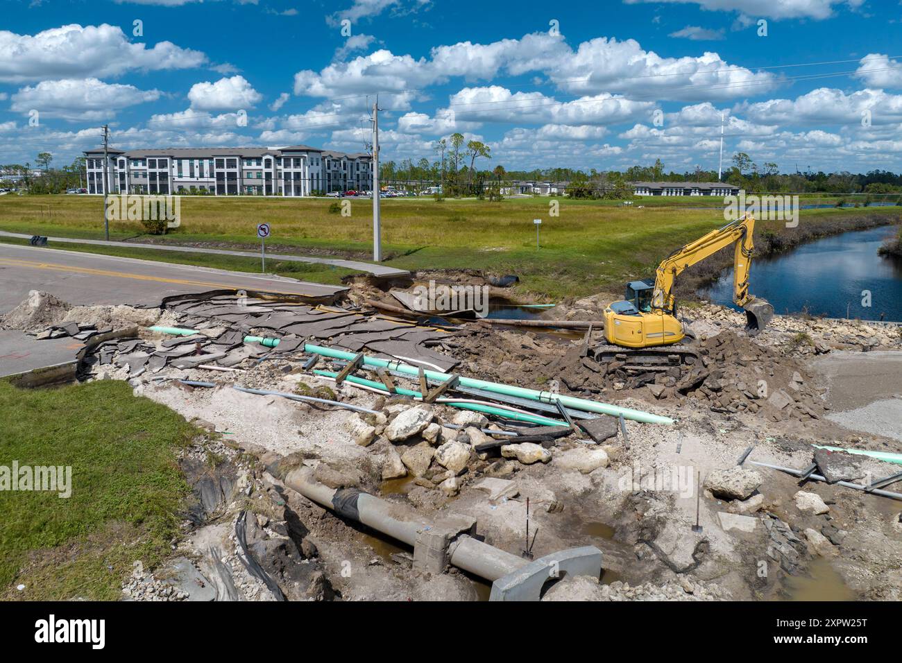Repair of destroyed bridge after hurricane flood in Florida. Reconstruction of damaged road ...