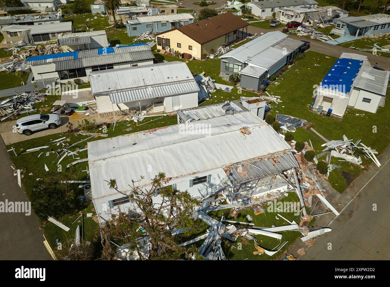 Severely damaged houses after hurricane Ian in Florida mobile home ...