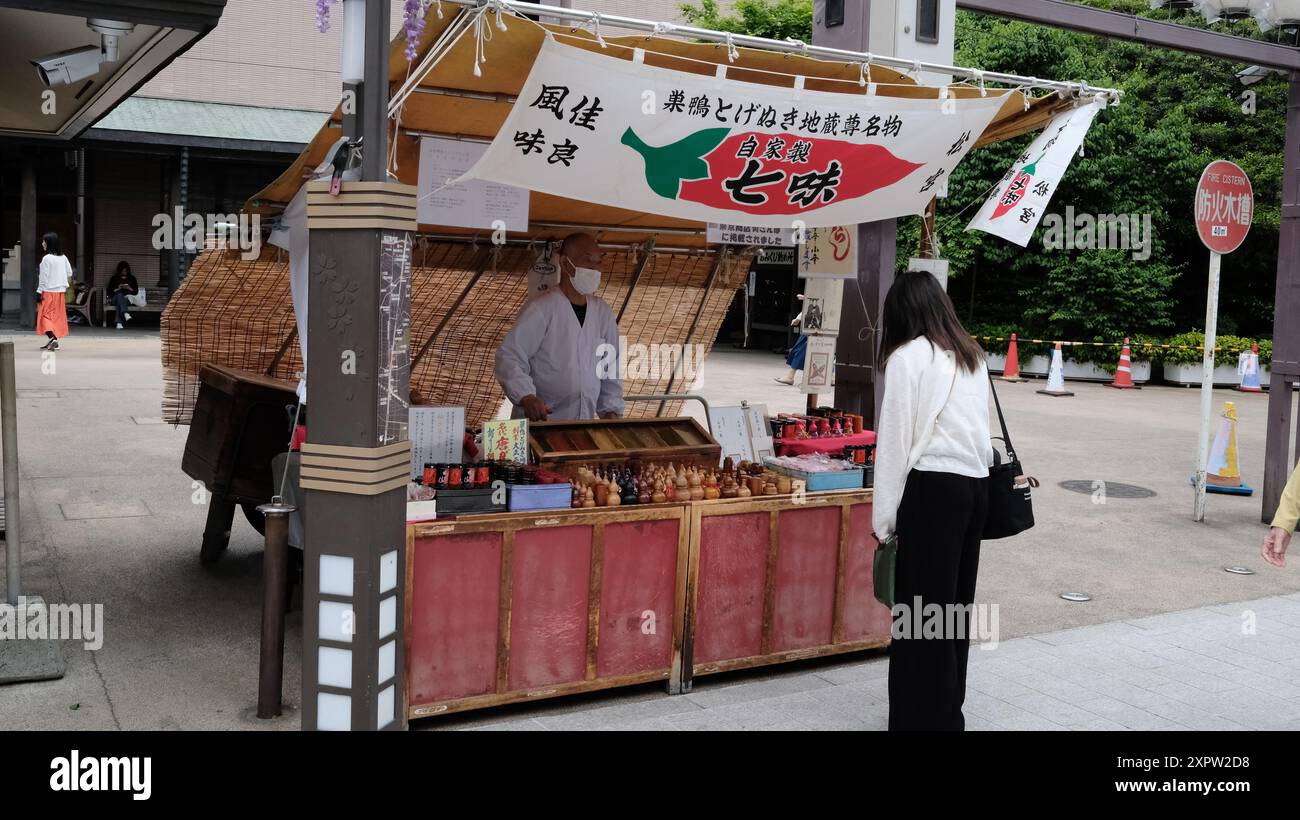 Tokyo- May 5 2024: the hawker sell the Shichimi in Sugamo. Shichimi is ...