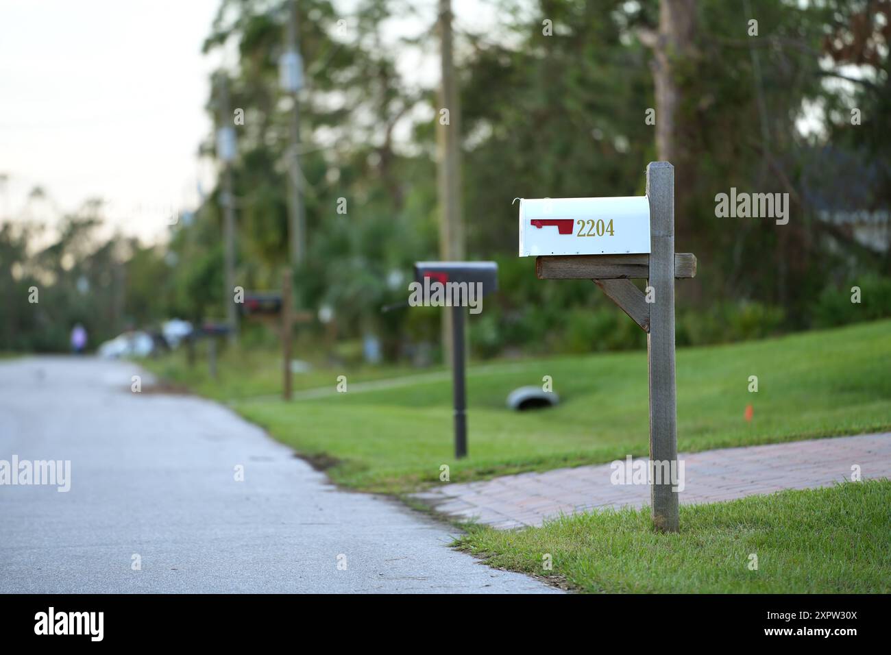Typical american outdoors mail box on suburban street side Stock Photo ...