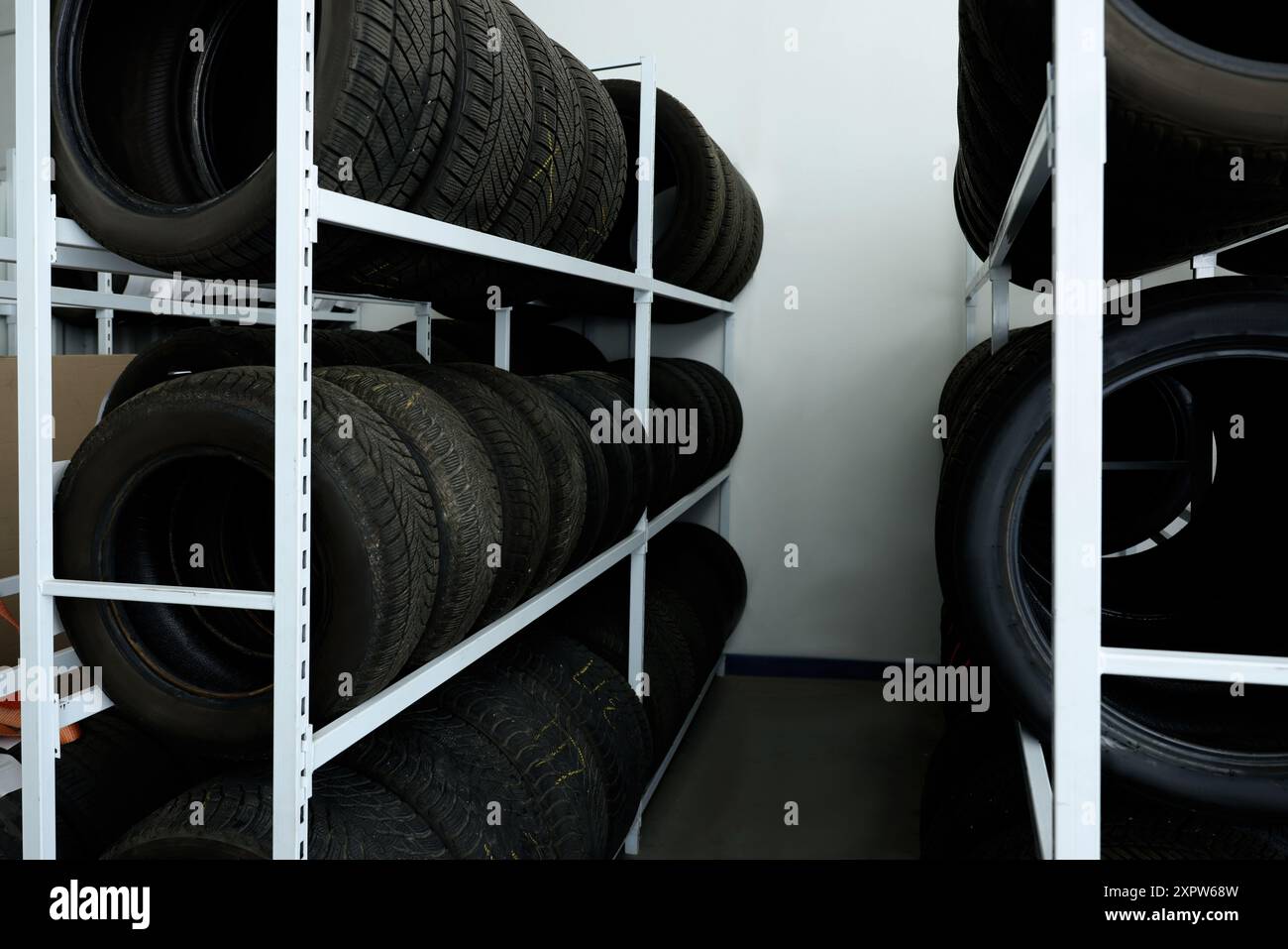 Group of car tires in auto store Stock Photo - Alamy
