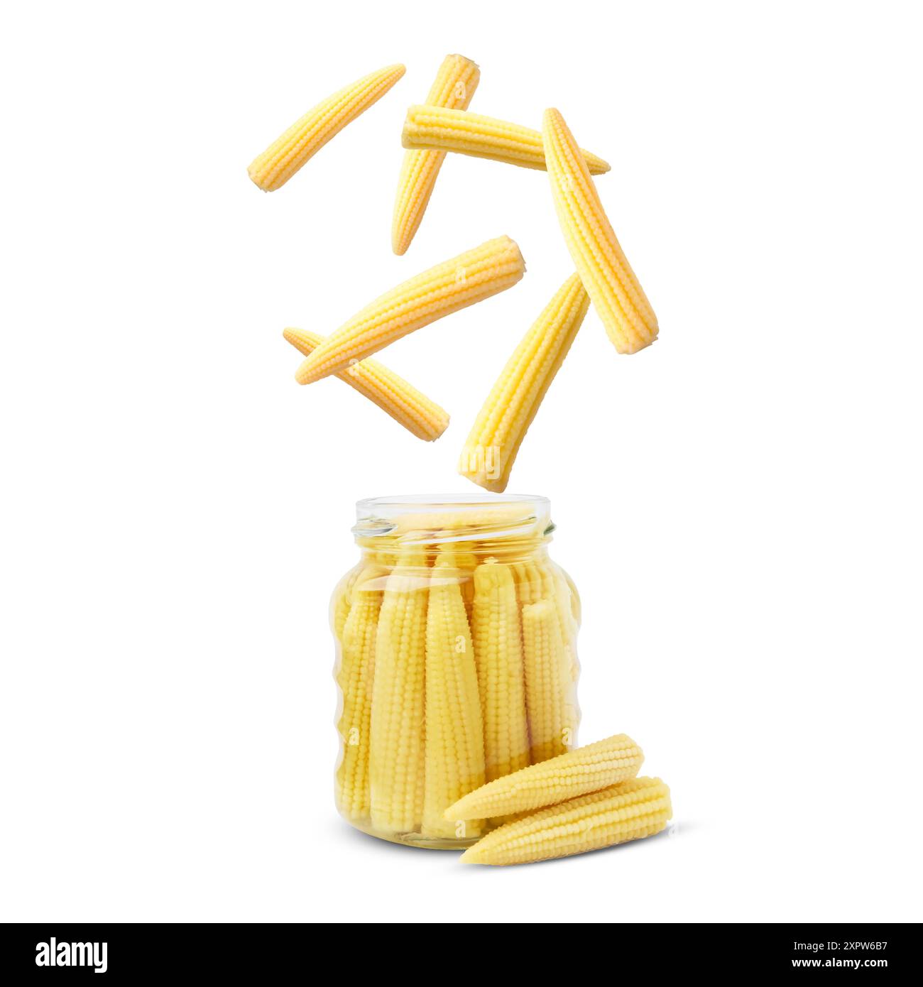 Baby corn cobs falling into jar on white background Stock Photo - Alamy