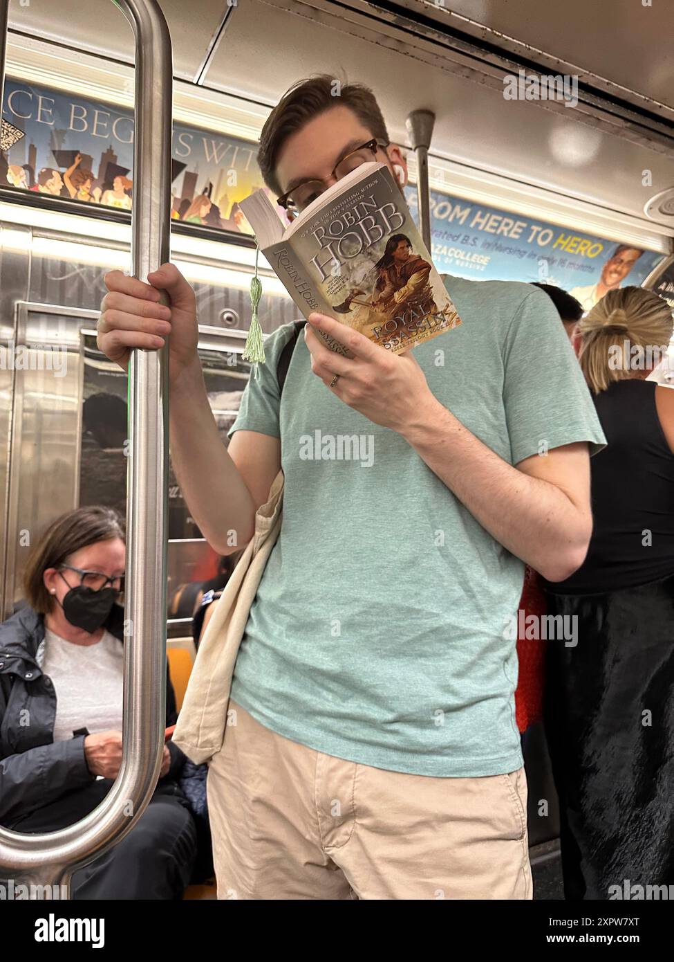New Yorker subway riders commuting on weekday Stock Photo - Alamy