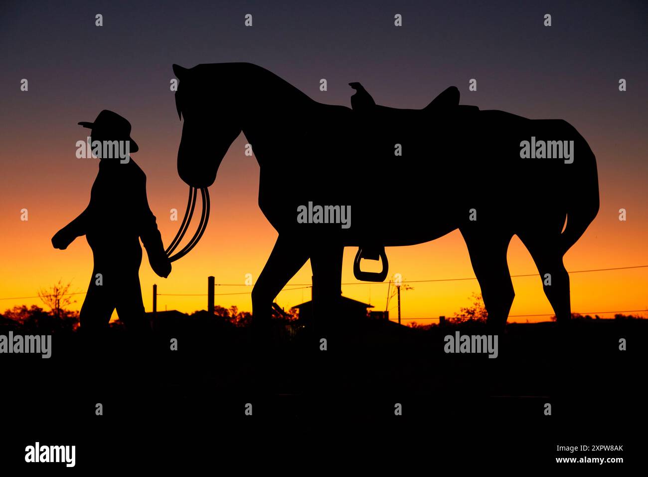 Sunset and silhouette of steel sculpture, Innamincka, Strzelecki Track ...