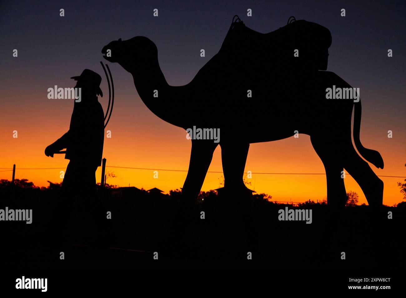 Sunset and silhouette of steel sculpture, Innamincka, Strzelecki Track ...