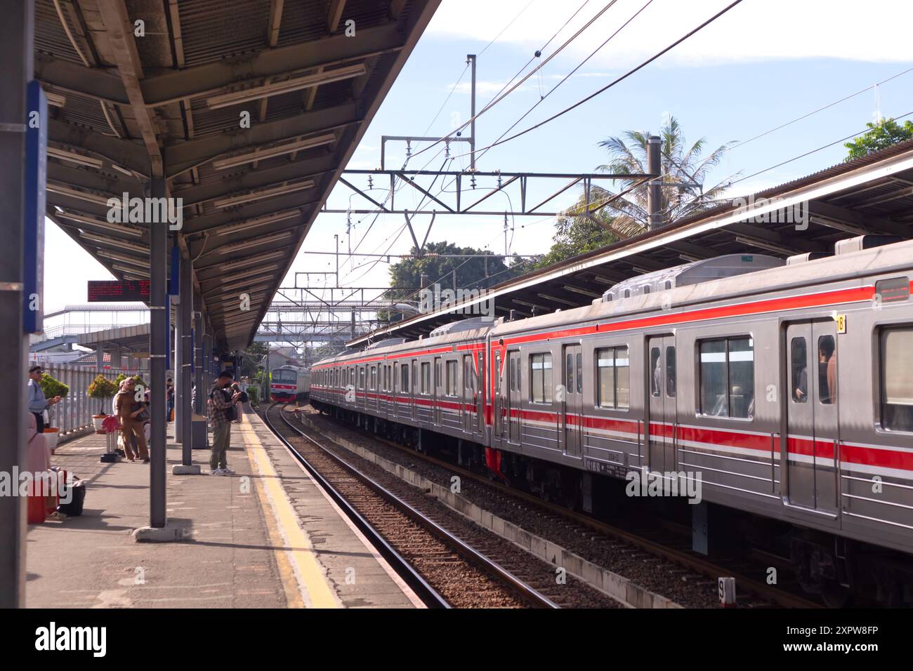 Jakarta, Indonesia - February 08, 2024: A commuter line train platform ...