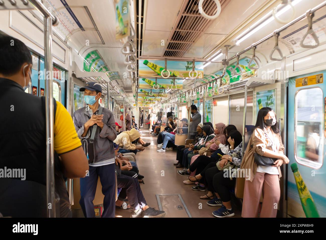 Jakarta, Indonesia - February 08, 2024: View inside the KRL commuter ...