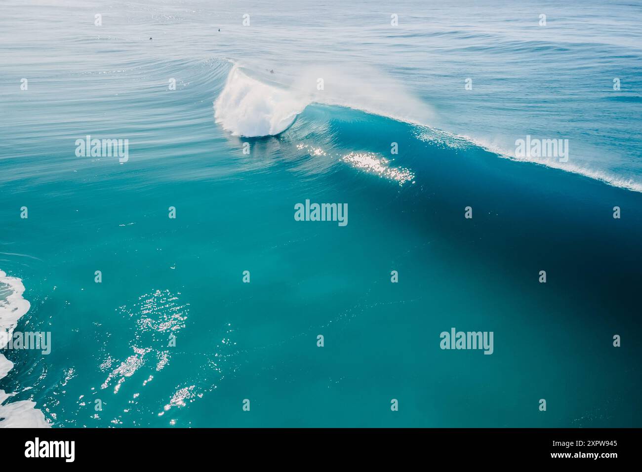 Blue barrel wave in tropical ocean. Breaking barrel wave. Aerial view ...
