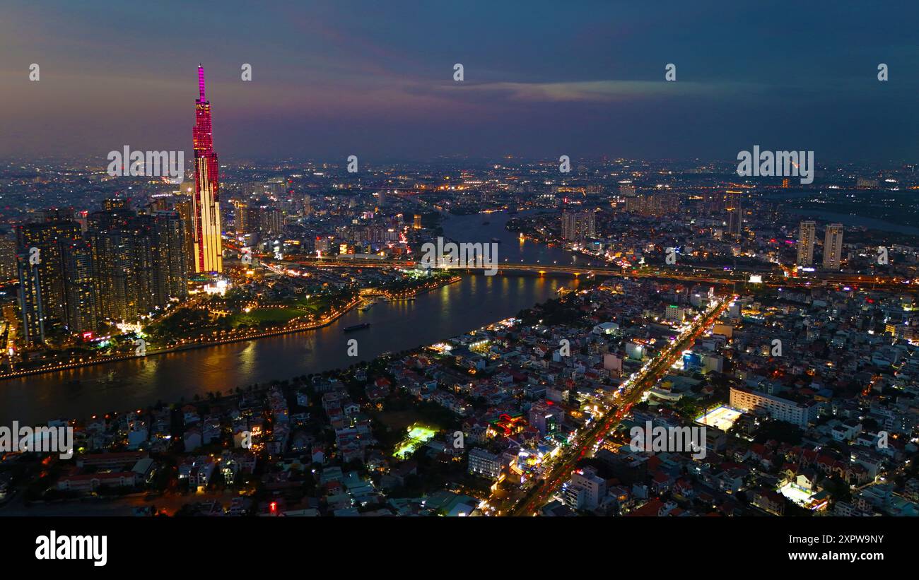 An aerial view of Ho Chi Minh City at sunset, vibrant colorful sky, the ...