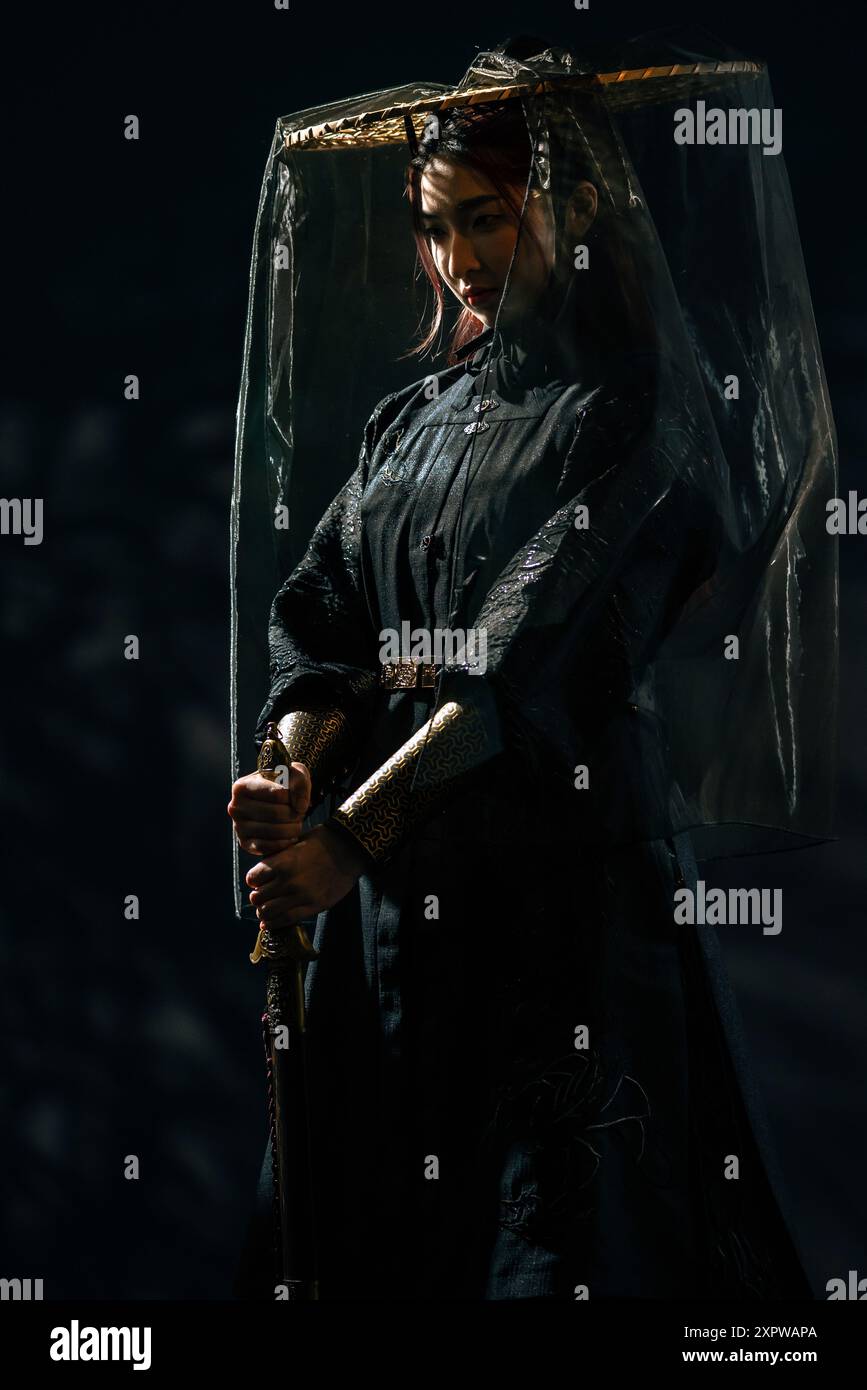 Female asian dramatic mood hi-res stock photography and images - Alamy