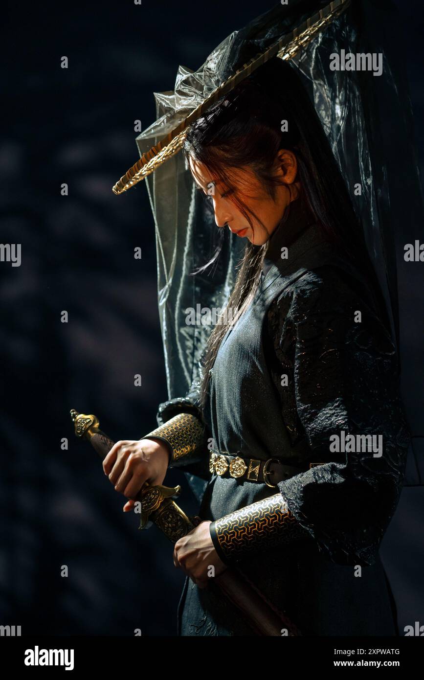 Female asian dramatic mood hi-res stock photography and images - Alamy