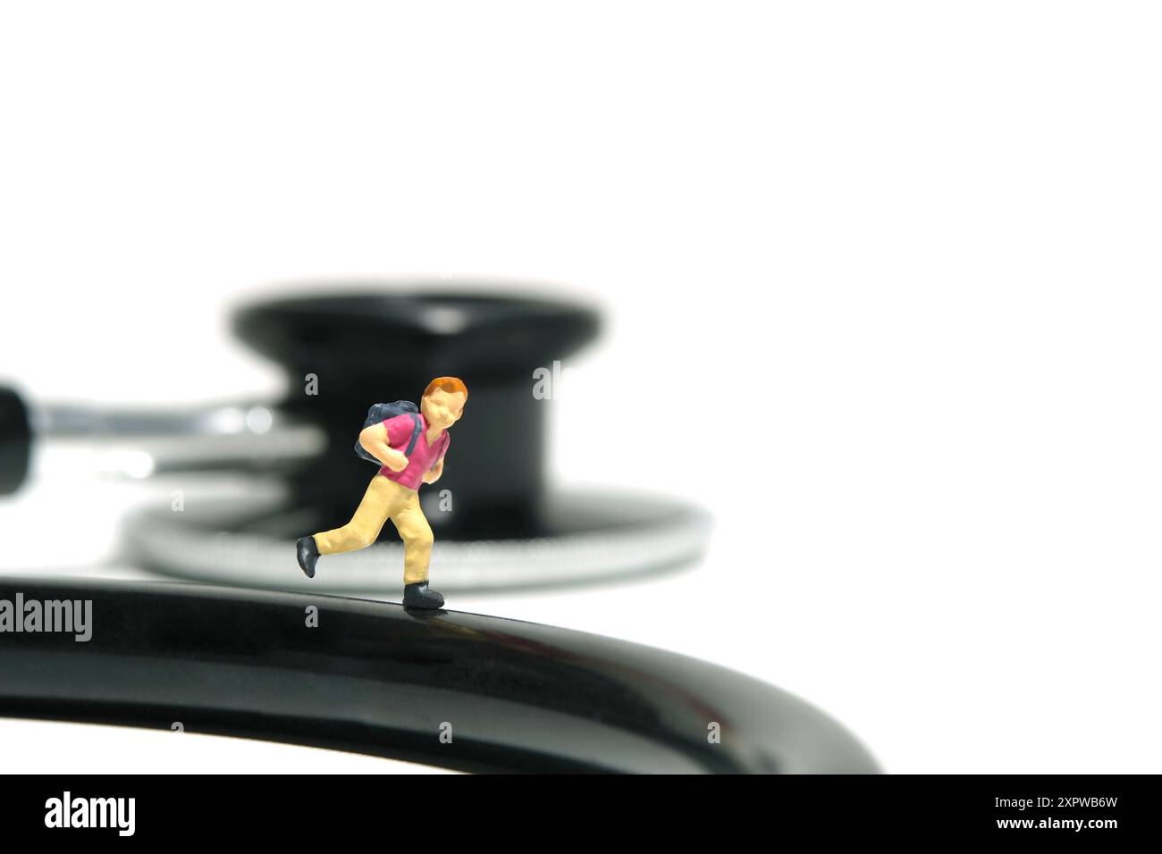 Miniature people toy figure photography. A boy kindergarten student ...