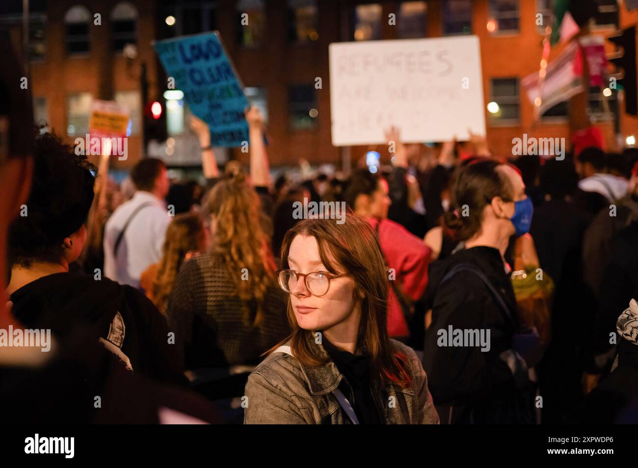 London, UK. 07th Aug, 2024. A crowd of counter-protesters is seen ...