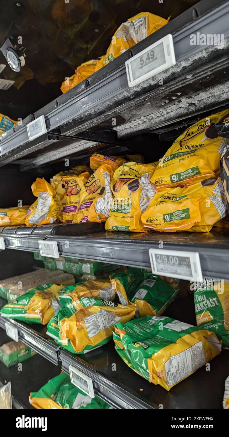 A display of breakfast hash brown in a freezer fridge at Superstore ...
