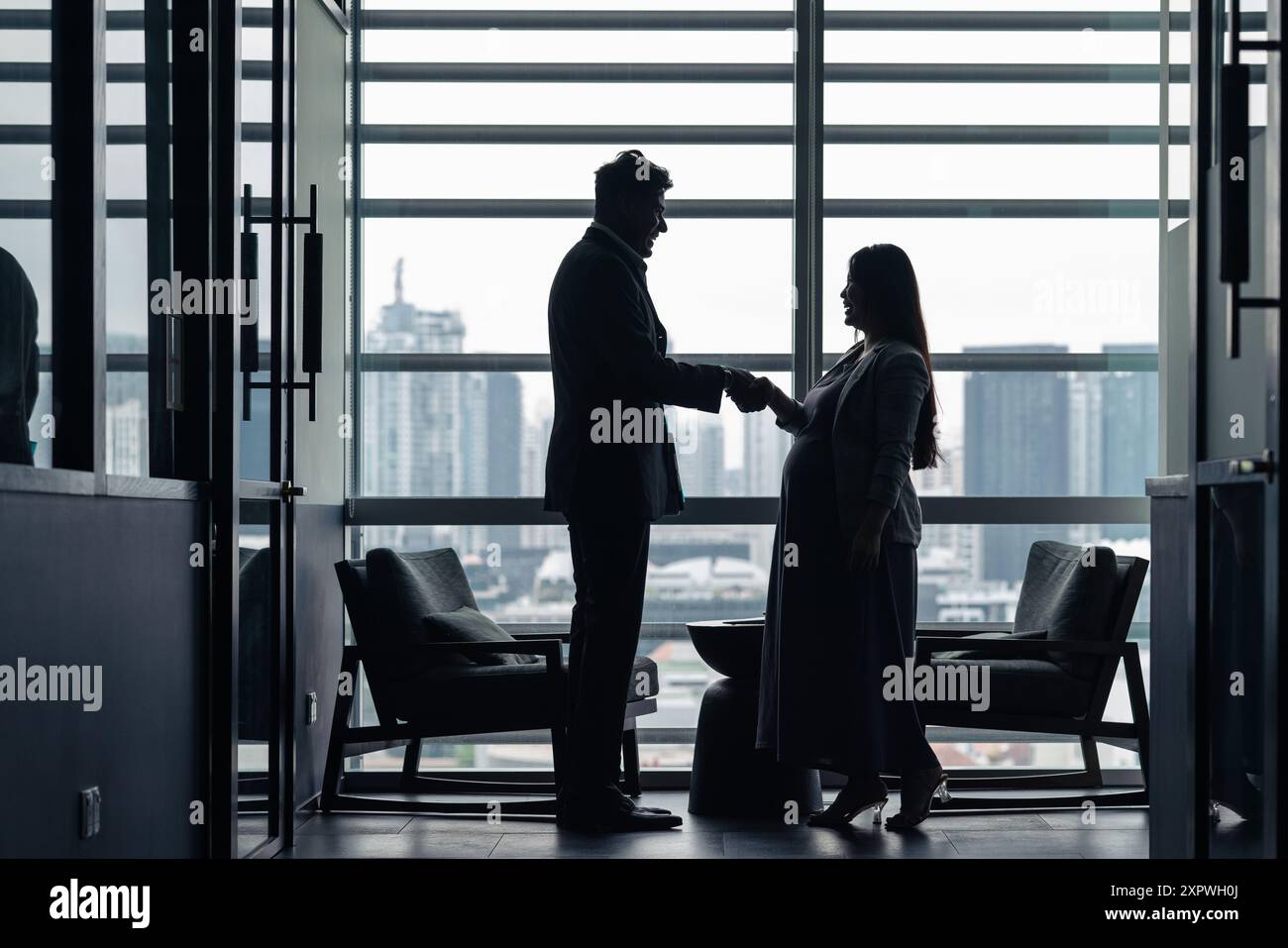 Diverse Asian business executives discussing Stock Photo - Alamy
