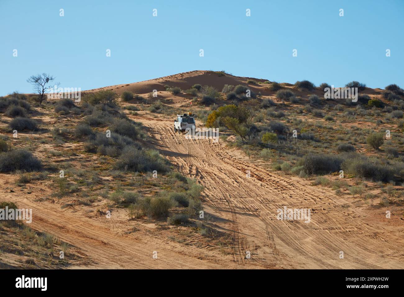 Four wheel drive going up "Big Red" dune, QAA Line, Simpson Desert ...