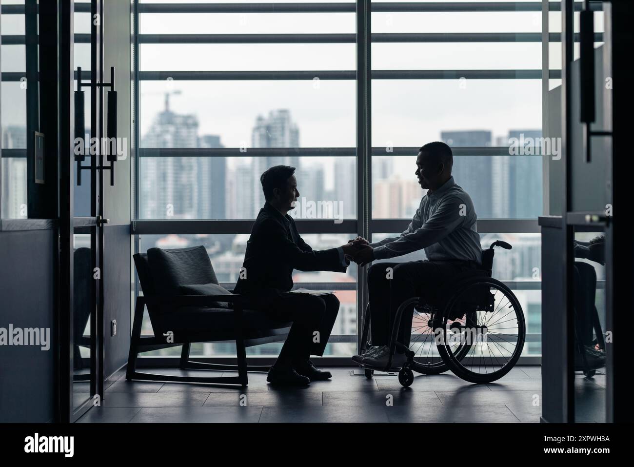 Diverse Asian business executives discussing Stock Photo - Alamy