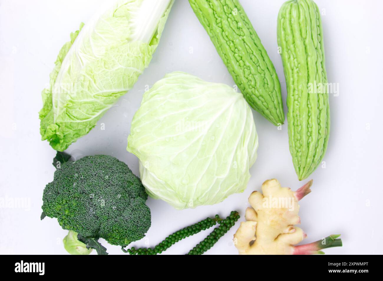 group of fresh vegetables, lettuce, cabbage, broccoli, green peppers ...