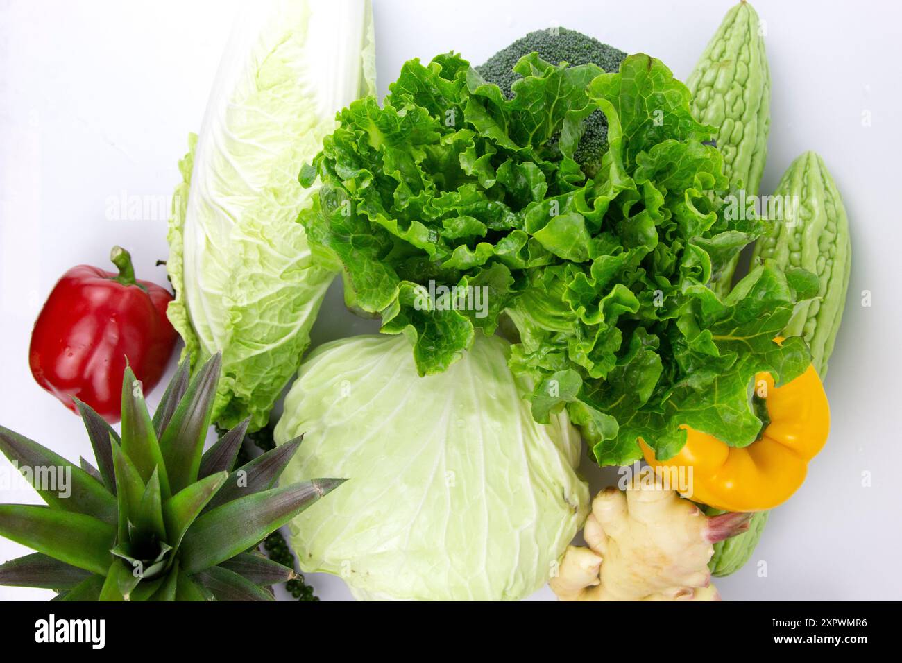 Groups of healthy green vegetables on white background Stock Photo - Alamy