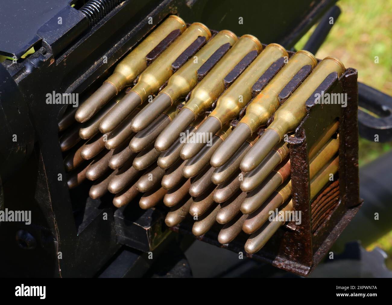 Close-up of a machine gun magazine loaded with bullets ready to be ...