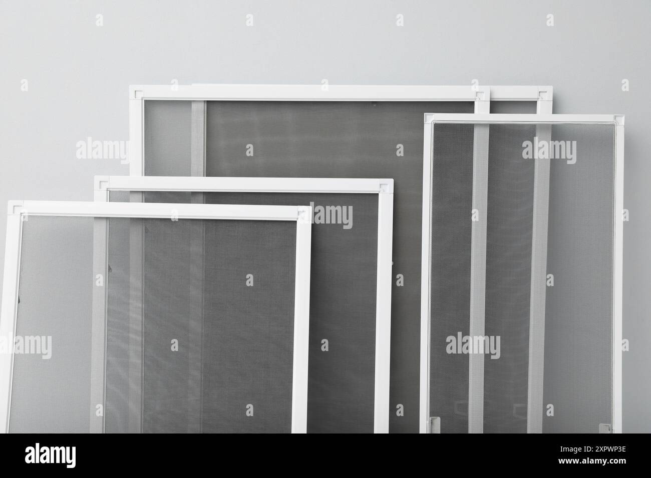 Set of window screens on light grey background Stock Photo - Alamy