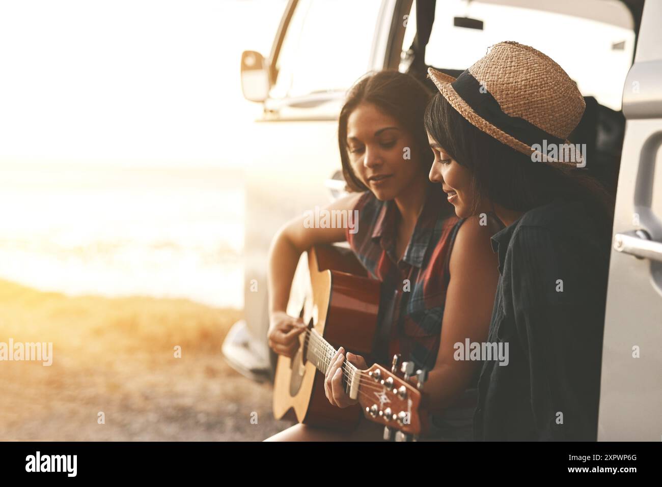 Road trip, music and women in car with guitar, singing and travel in ...