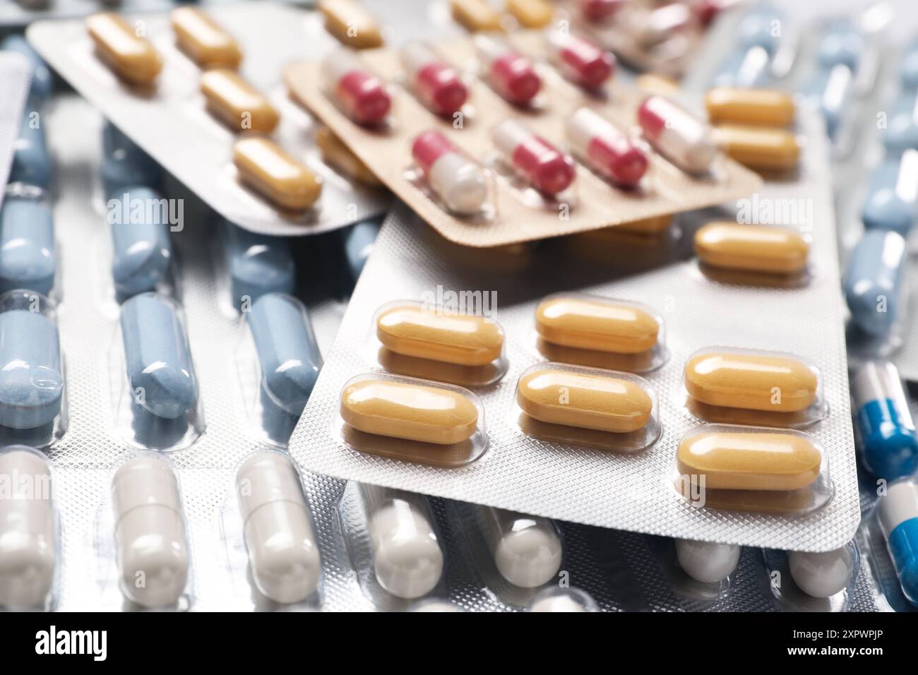 Antibiotic pills in blisters as background, closeup Stock Photo - Alamy
