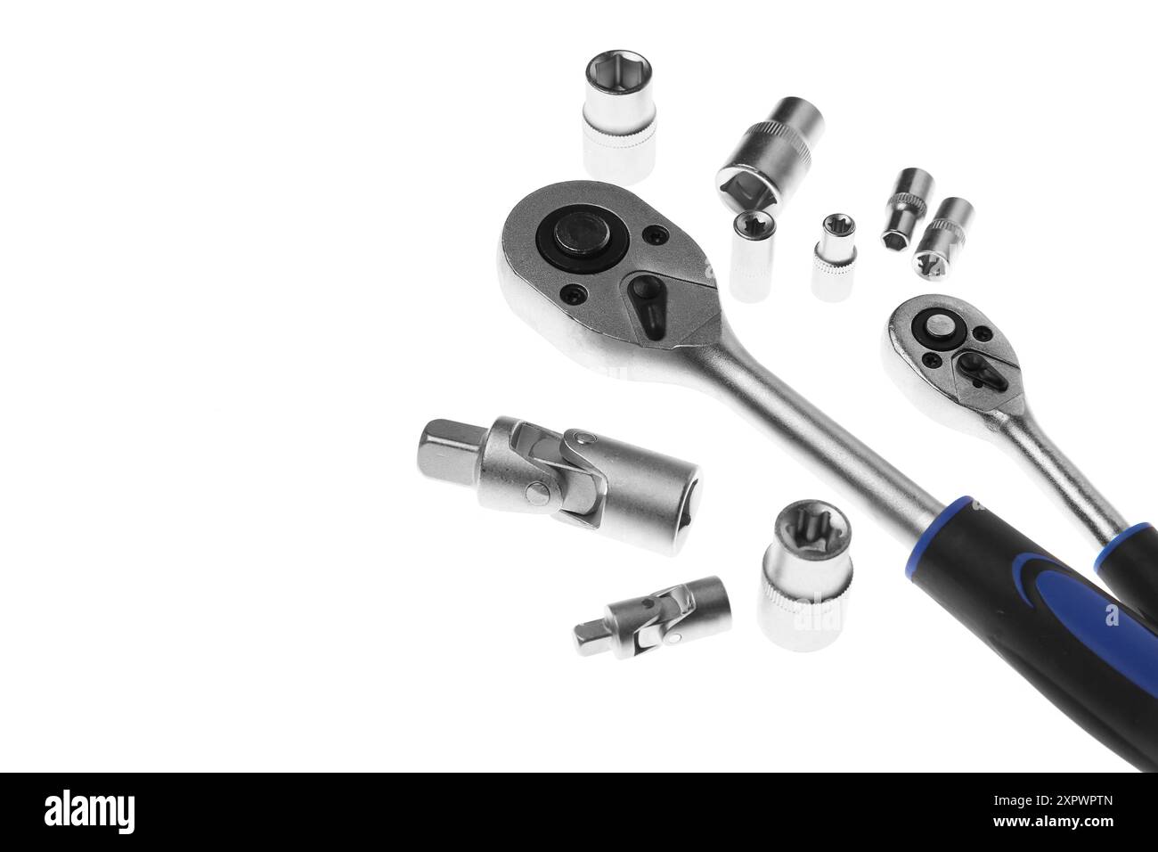 Two torque wrenches and nuts on white background. Auto mechanic tools ...