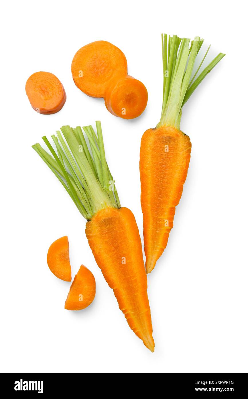 Whole and cut fresh carrots isolated on white, top view Stock Photo - Alamy
