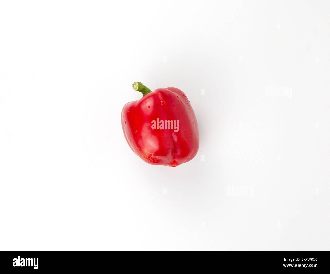 Organic Red bell pepper isolated on white background Stock Photo - Alamy