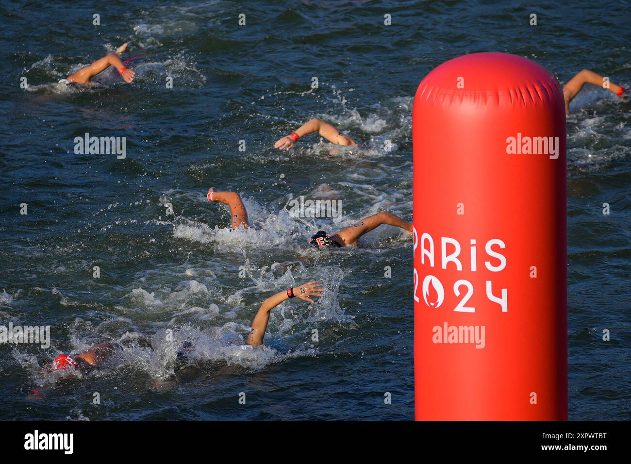 Athletes compete during the marathon swimming women's 10km competition ...